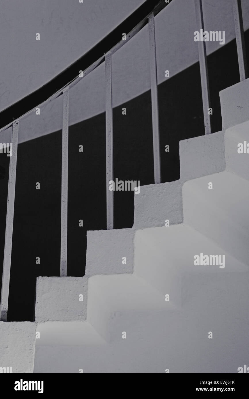 Concrete stairs with railings against the wall Stock Photo - Alamy