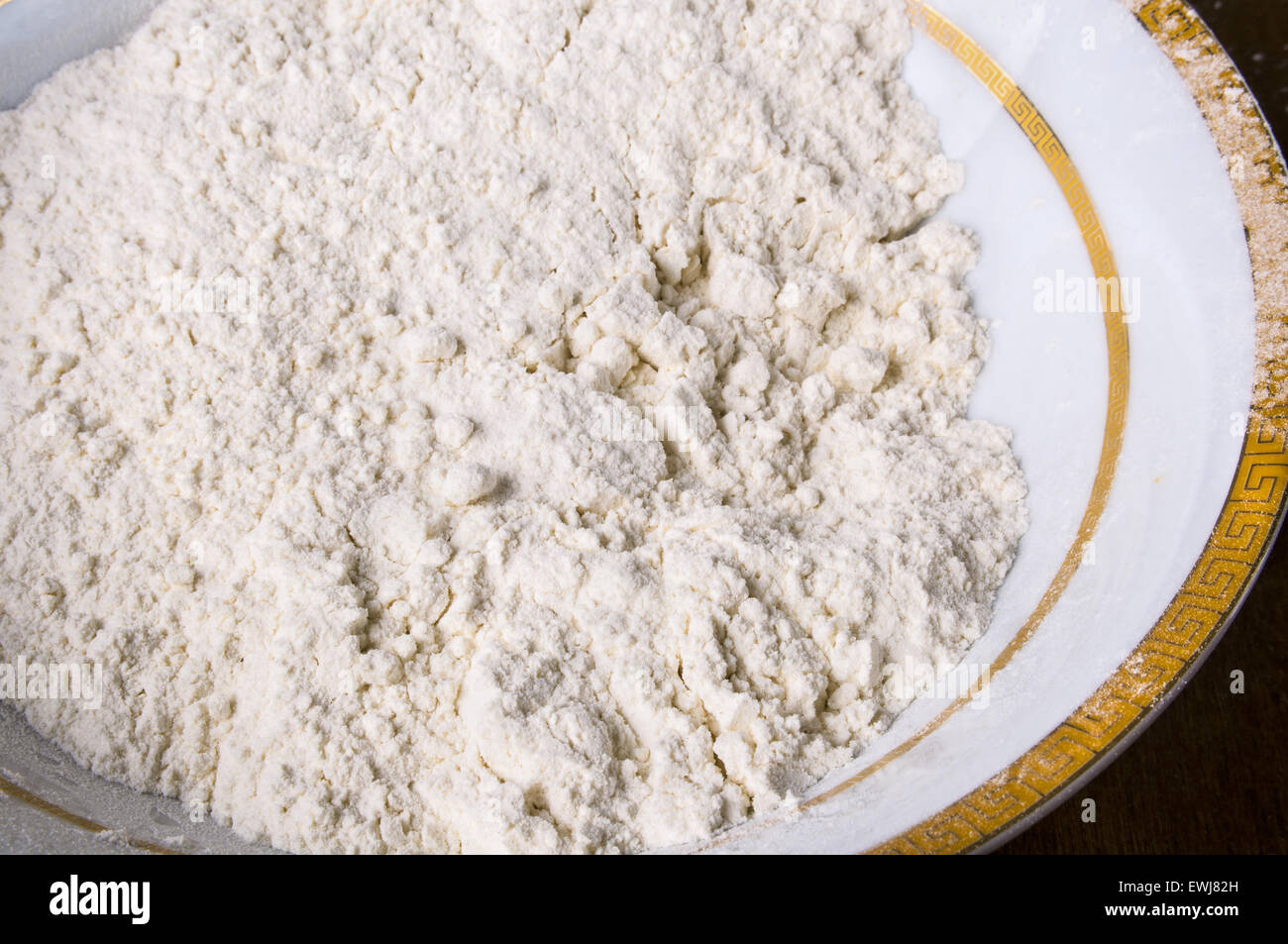 Ceramic bowl with flour Stock Photo - Alamy