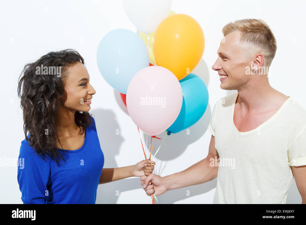 Sweet couple isolated on white Stock Photo - Alamy