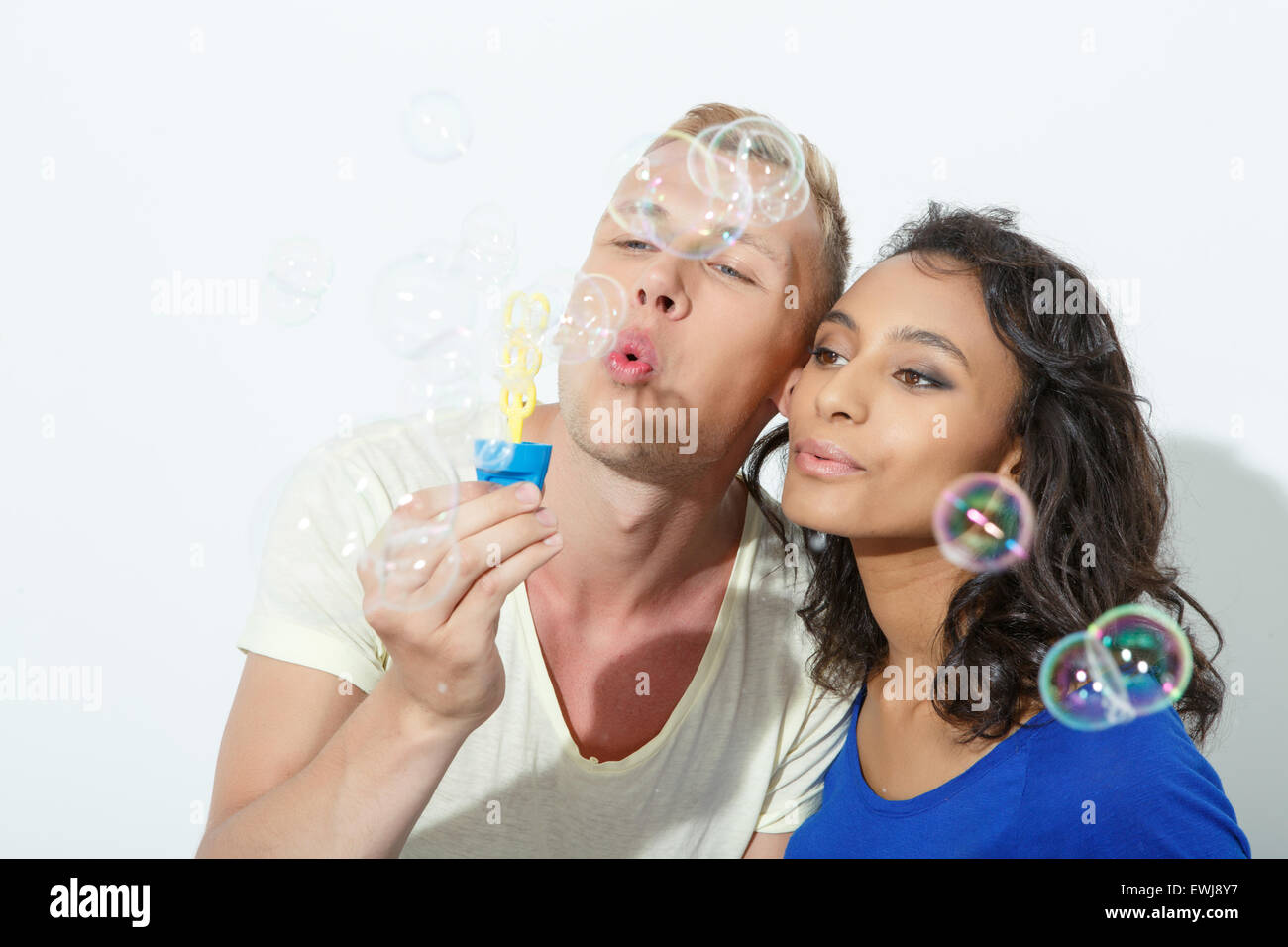 Sweet couple isolated on white Stock Photo - Alamy