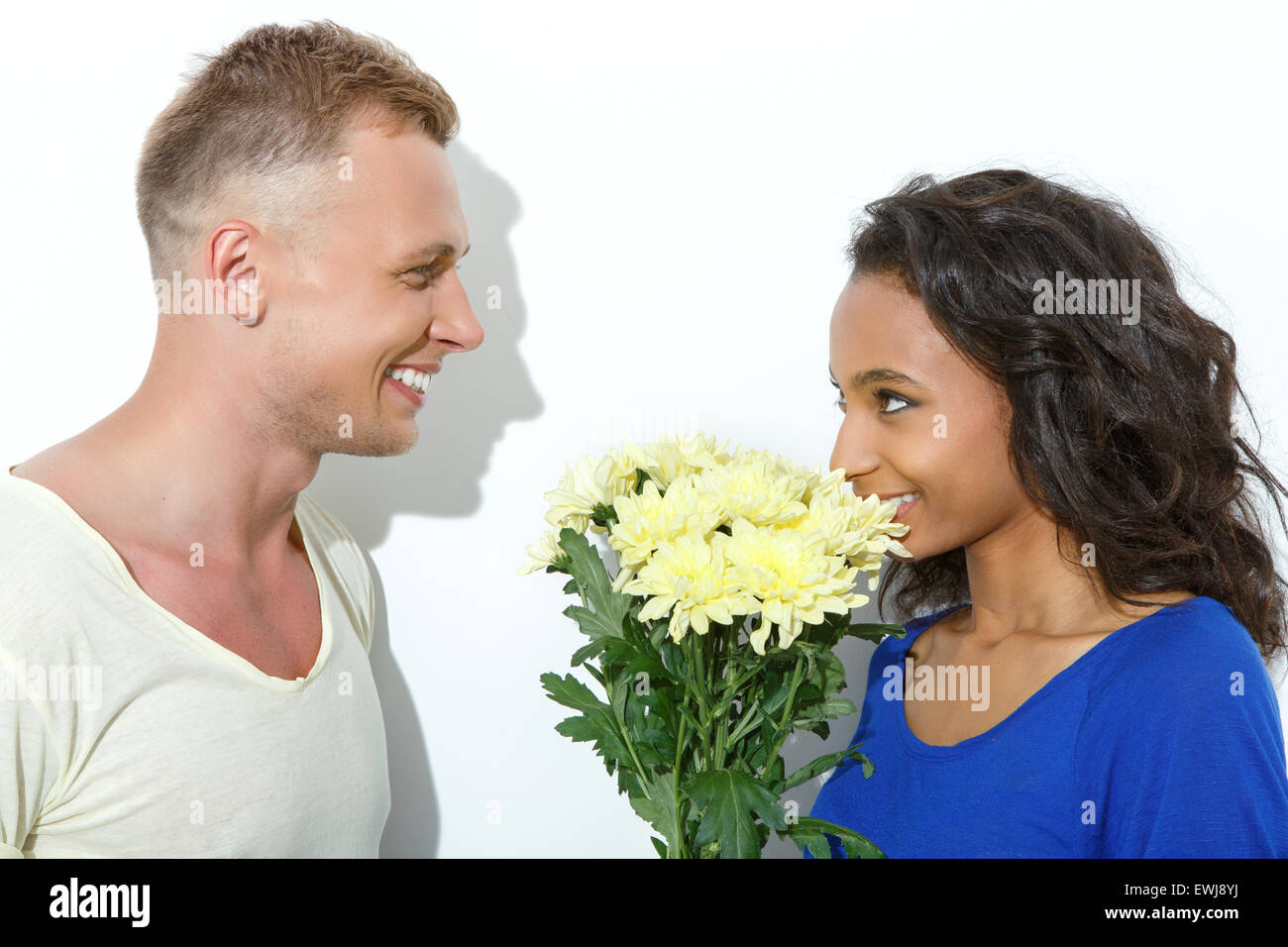 Funny mixed couple isolated on white Stock Photo - Alamy