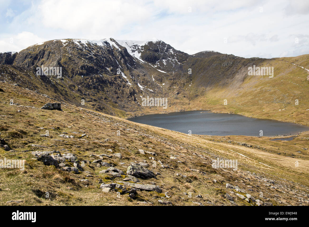Helvellyn mountain peak and red tarn corrie lake hi-res stock ...