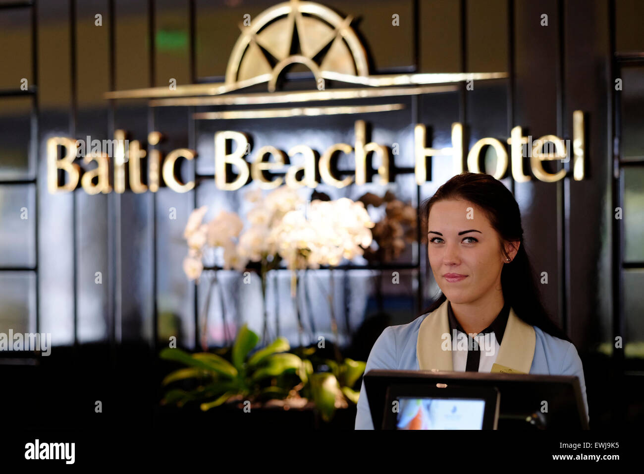 A receptionist at work in the front desk of Baltic Beach hotel at the ...