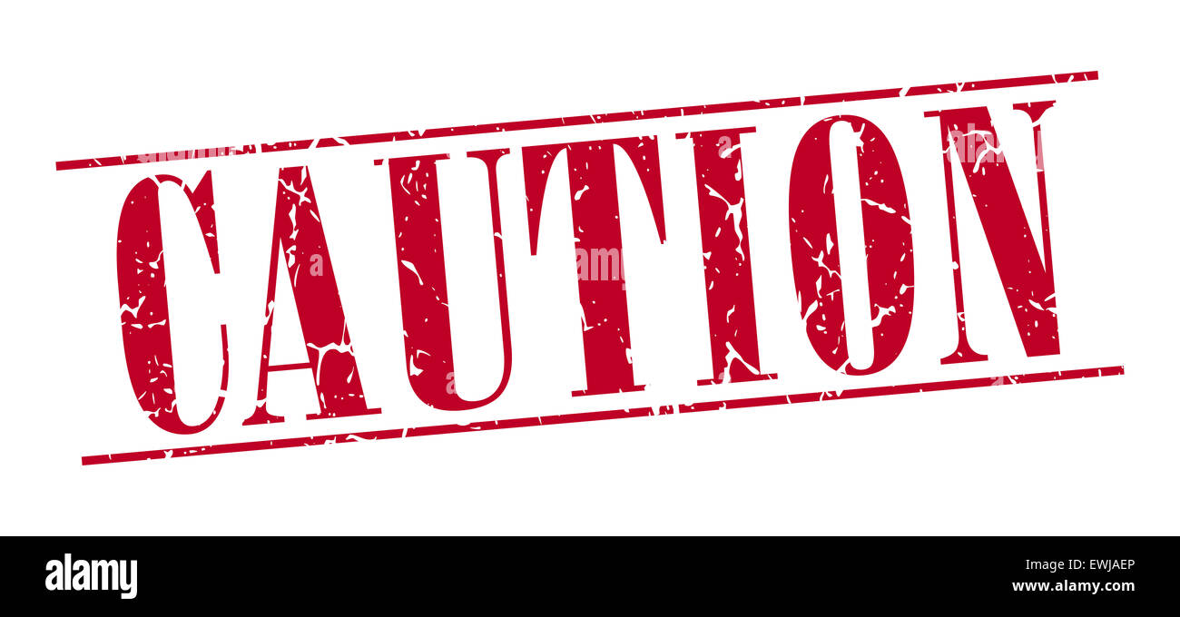 caution red grunge vintage stamp isolated on white background Stock ...