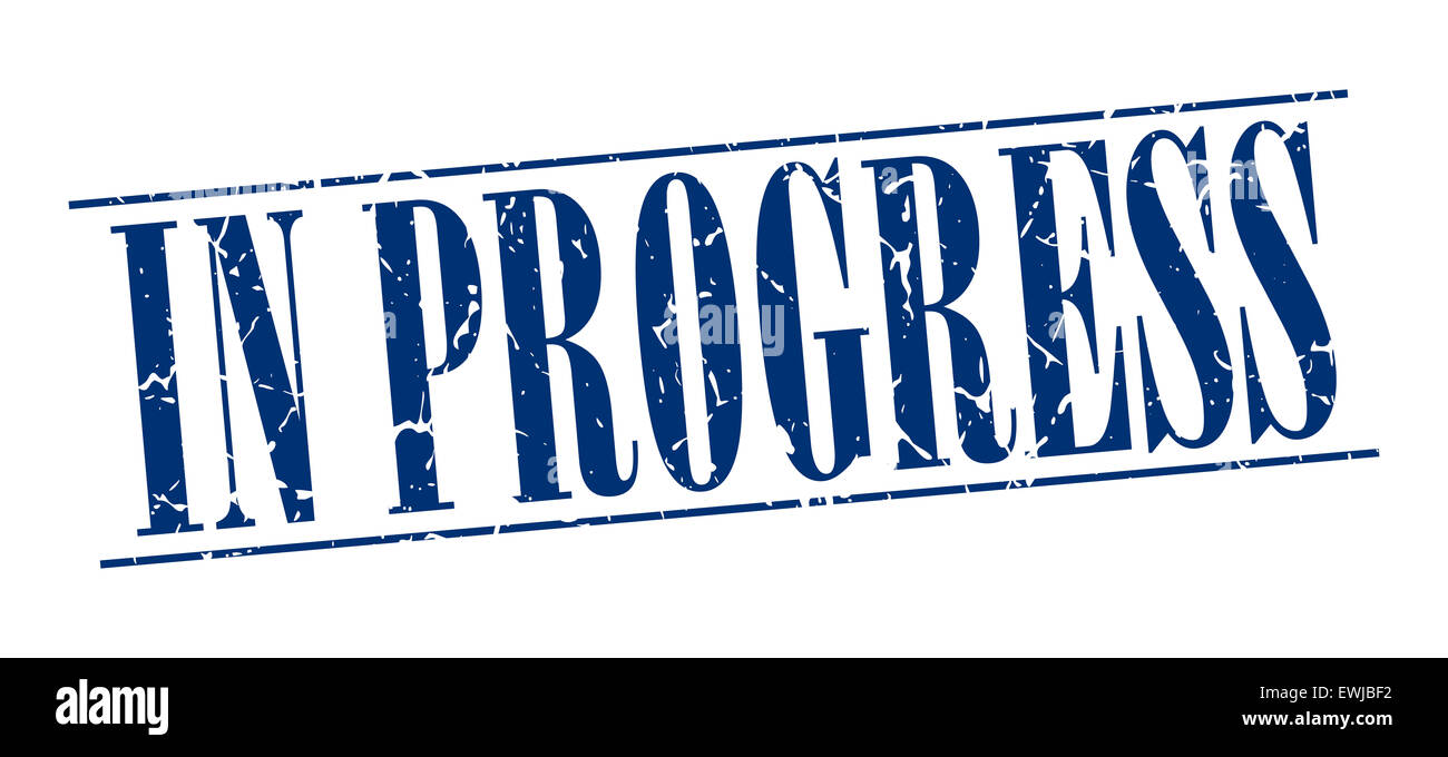 in progress blue grunge vintage stamp isolated on white background ...