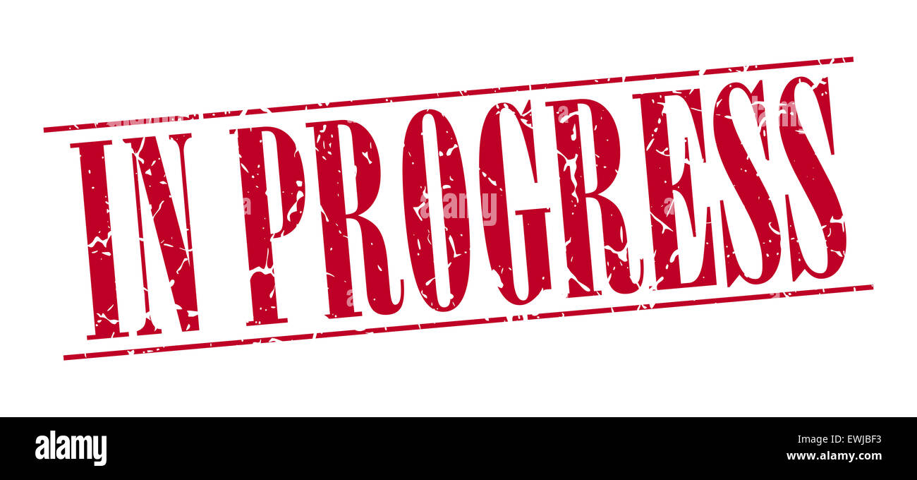 in progress red grunge vintage stamp isolated on white background Stock ...