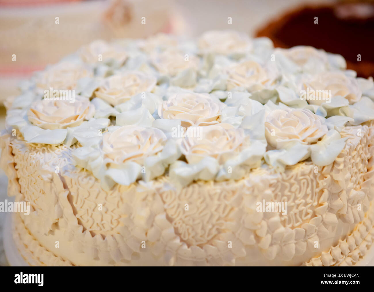 View at the white wedding cake Stock Photo - Alamy