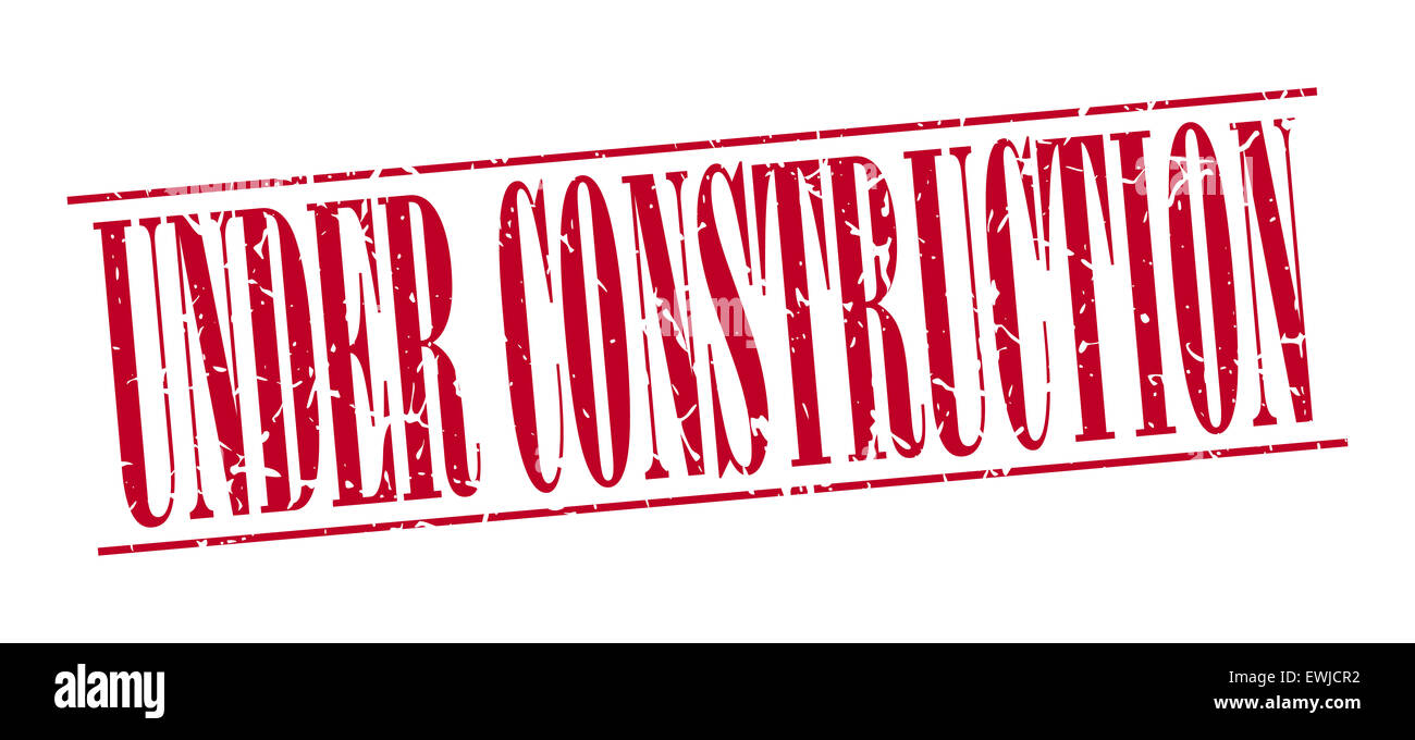 under construction red grunge vintage stamp isolated on white ...