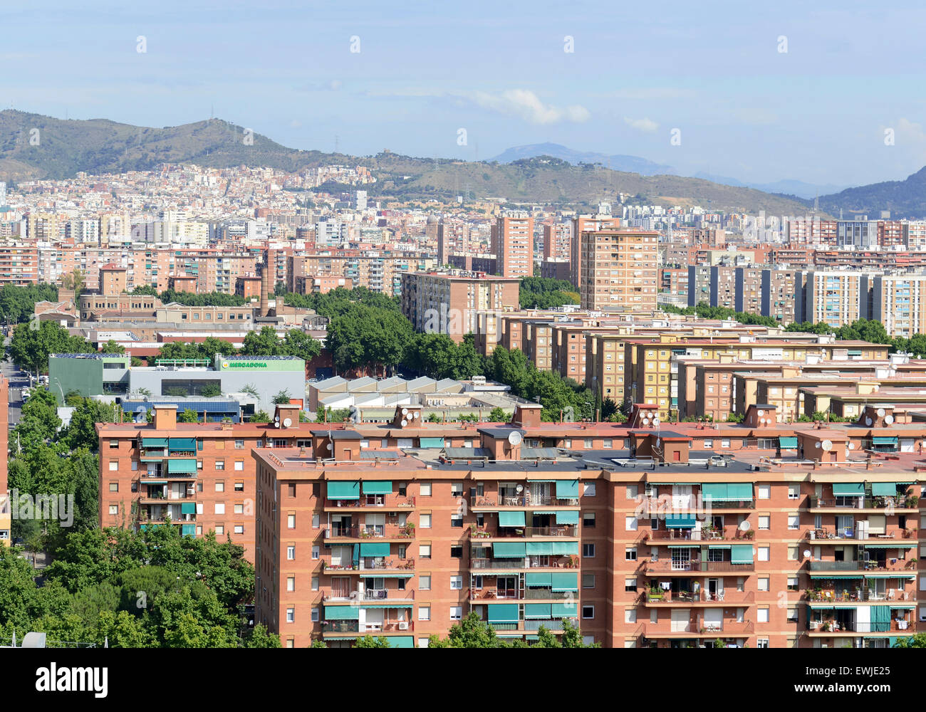 Suburban scene with homes and apartment buildings, Barcelona, Spain ...