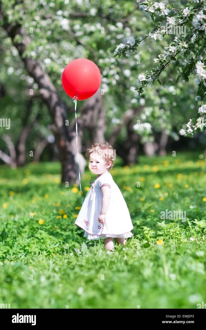 Big red balloon hi-res stock photography and images - Alamy