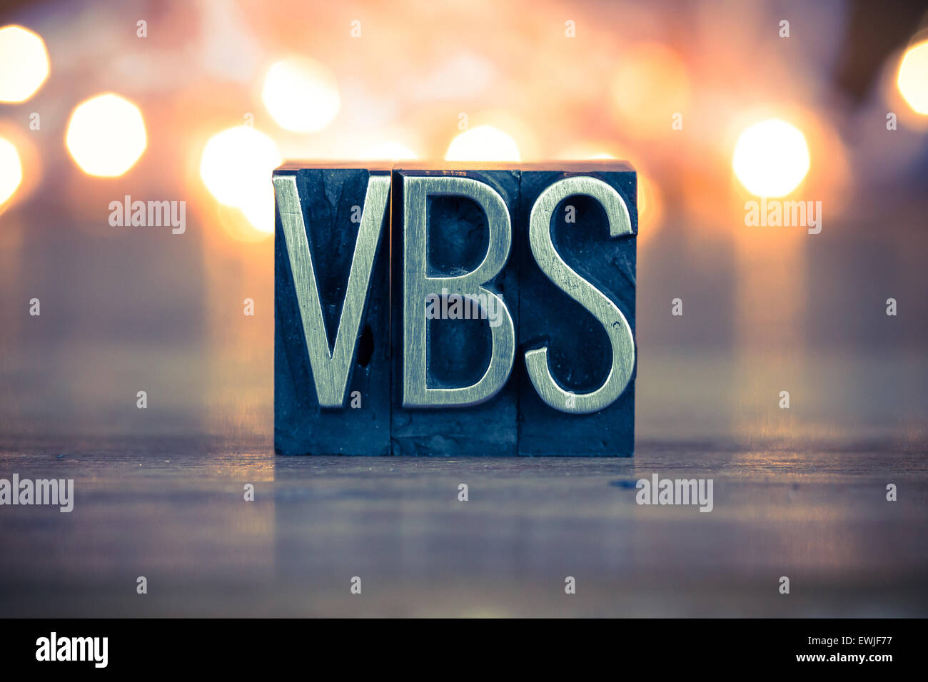 The word VBS written in vintage metal letterpress type on a soft ...