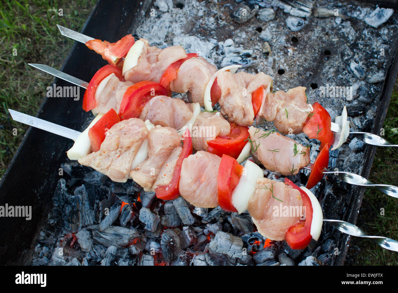 Grilling shashlik on barbecue grill Stock Photo - Alamy