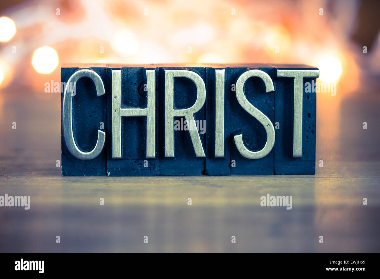 The word CHRIST written in vintage metal letterpress type on a soft ...