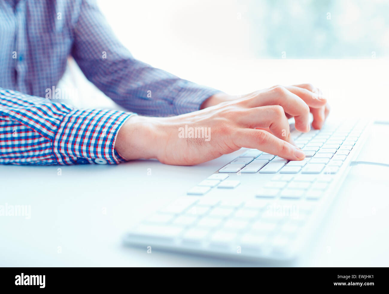 Male hands on pc keyboard hi-res stock photography and images - Alamy