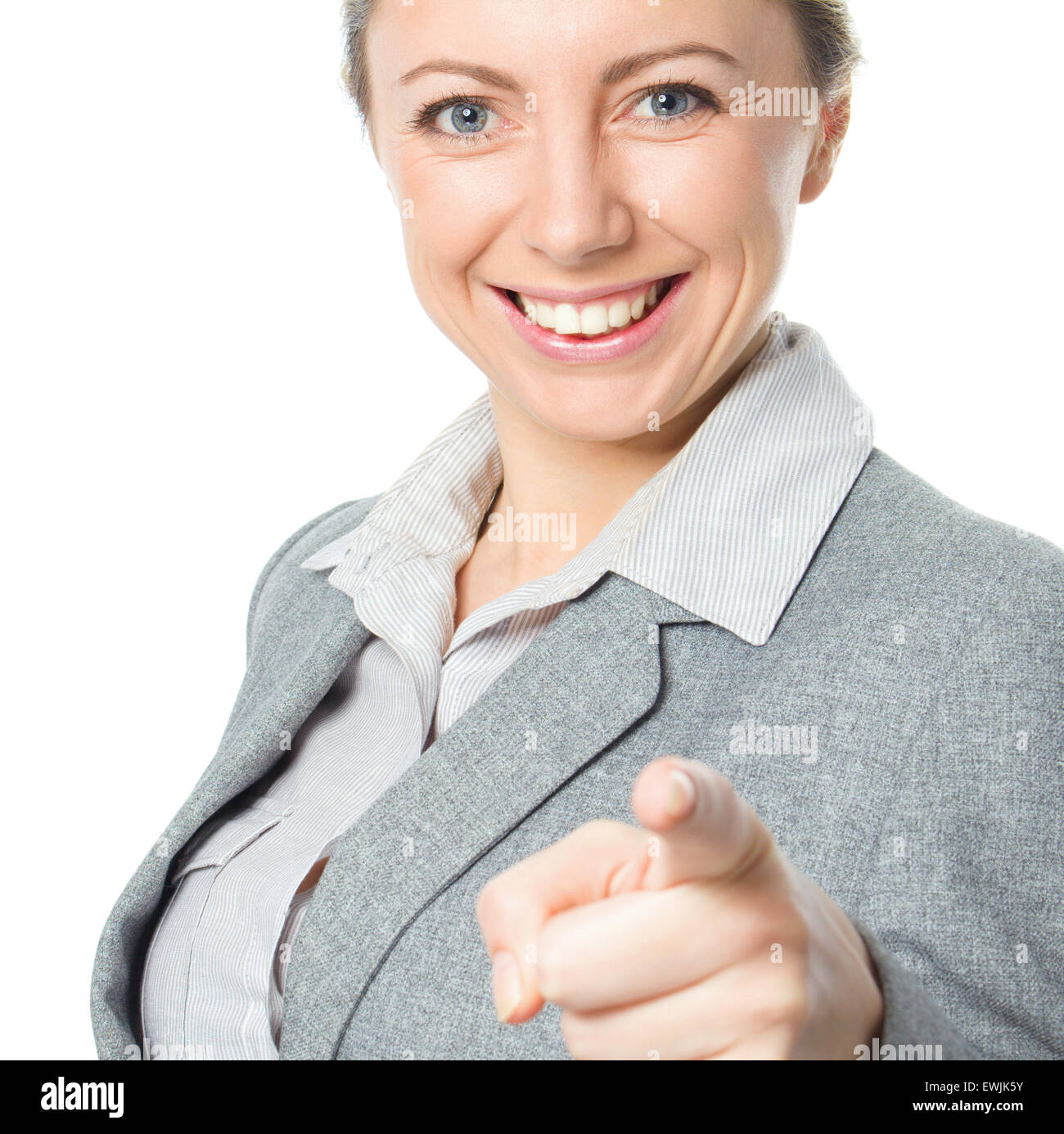 Portrait of young business woman pointing finger at viewer, isolated ...