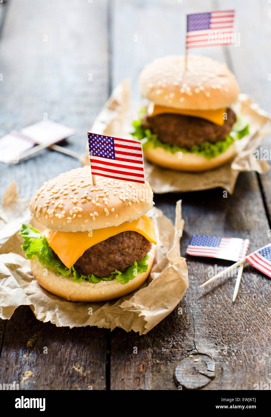 Mini beef burgers with American flag on wooden backgound,selective ...