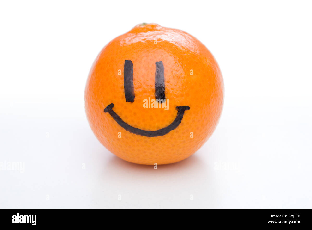 Smiling orange mandarin or tangerine fruit isolated on white background ...