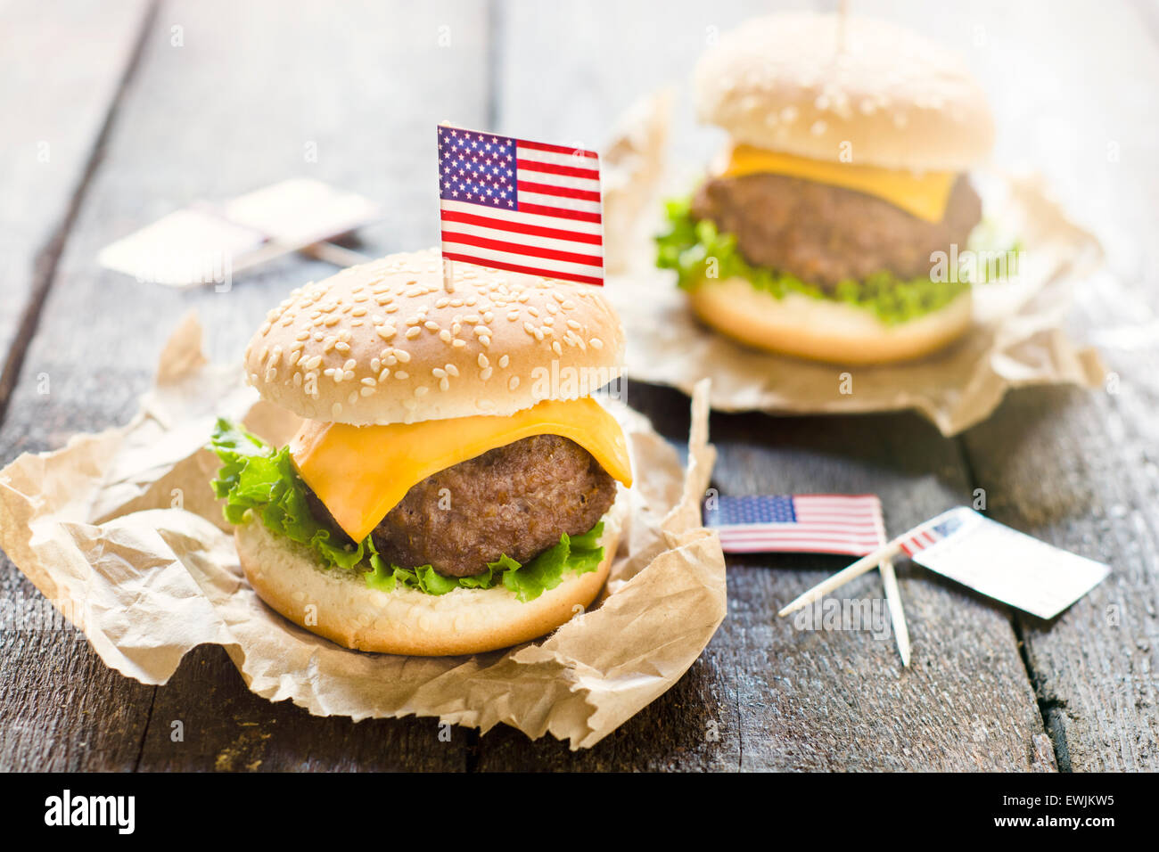 Mini beef burgers with American flag on wooden backgound,selective ...