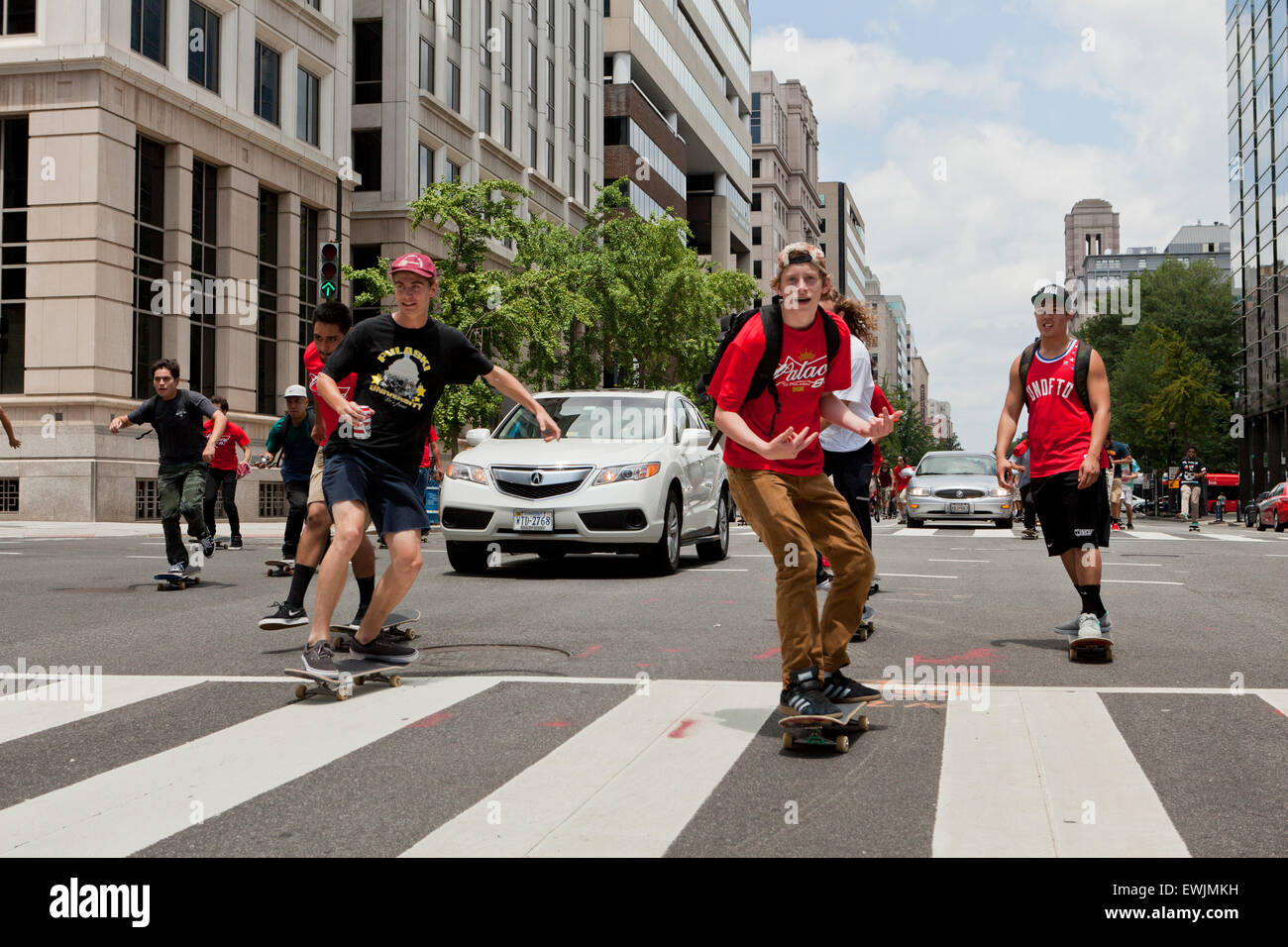 Street skateboarders riding in road - USA Stock Photo - Alamy