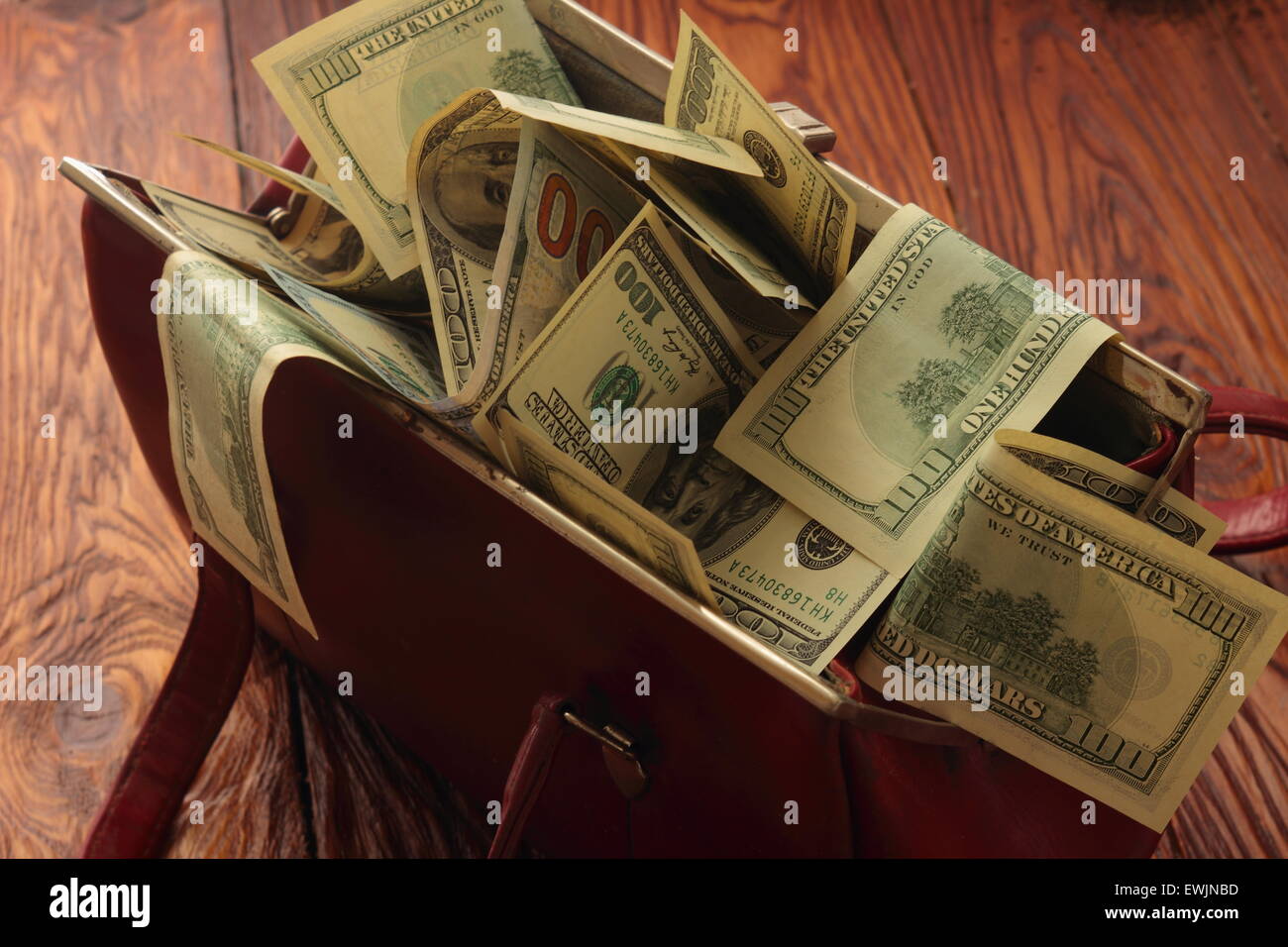 Bag of dollars hi-res stock photography and images - Alamy
