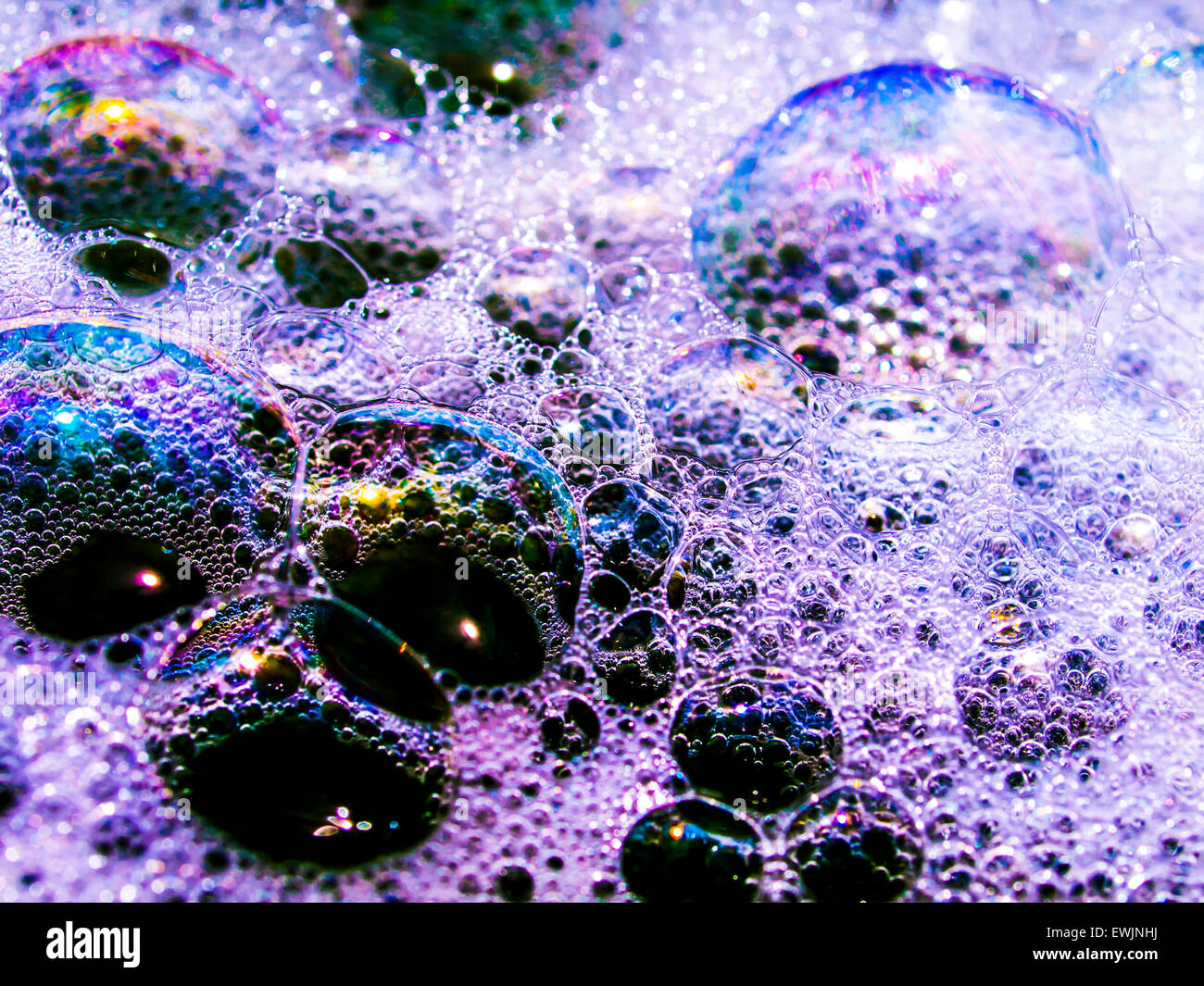Bubbles with rainbow light and reflections Stock Photo - Alamy