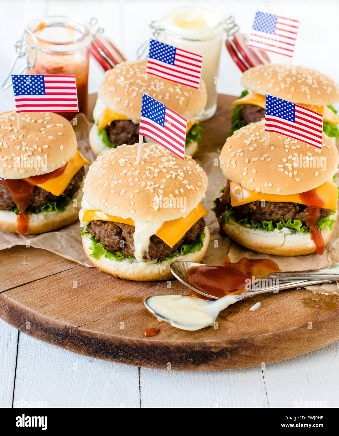 American mini beef burgers with cheese and USA flags,selective focus ...
