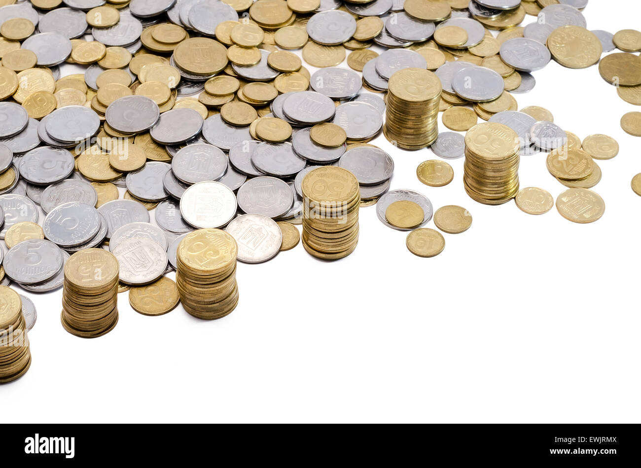 big quantity of coins yellow and gray scattered Stock Photo - Alamy