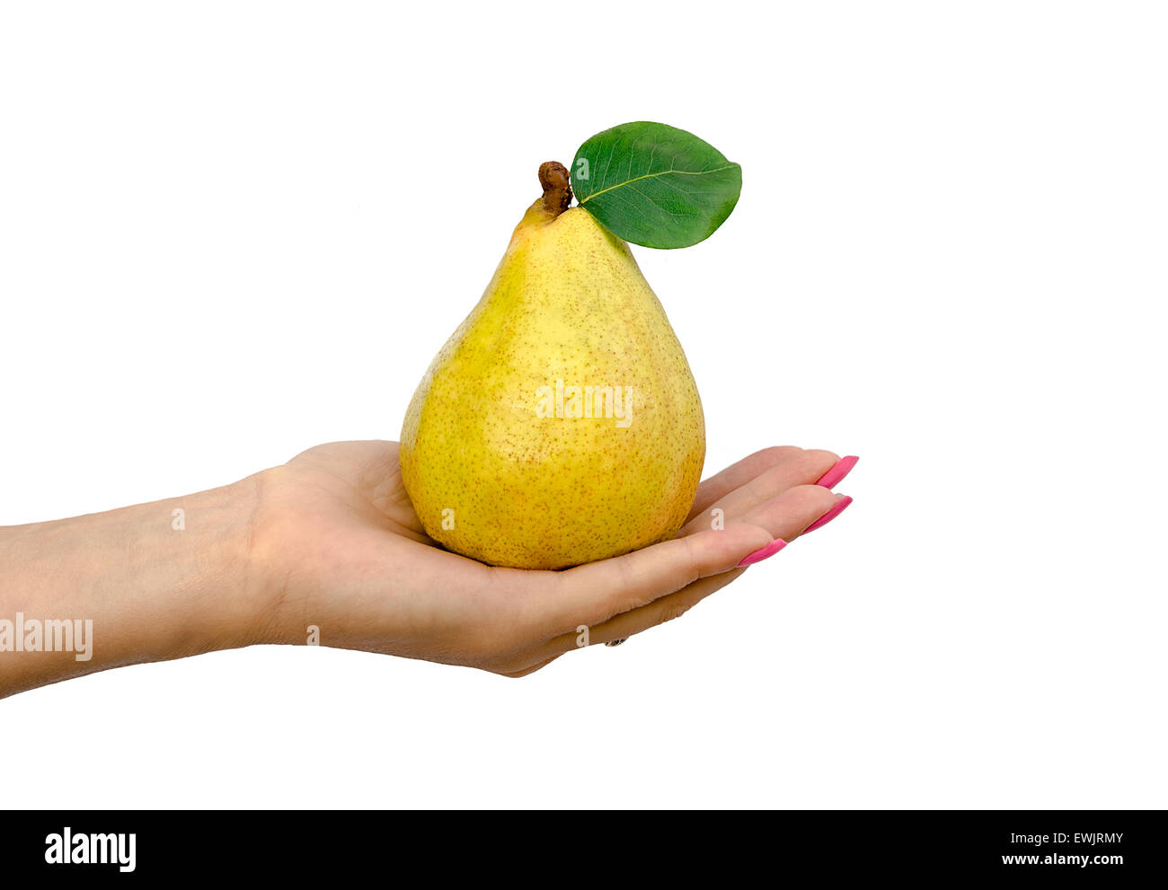 the woman holds a pear in hand Stock Photo - Alamy