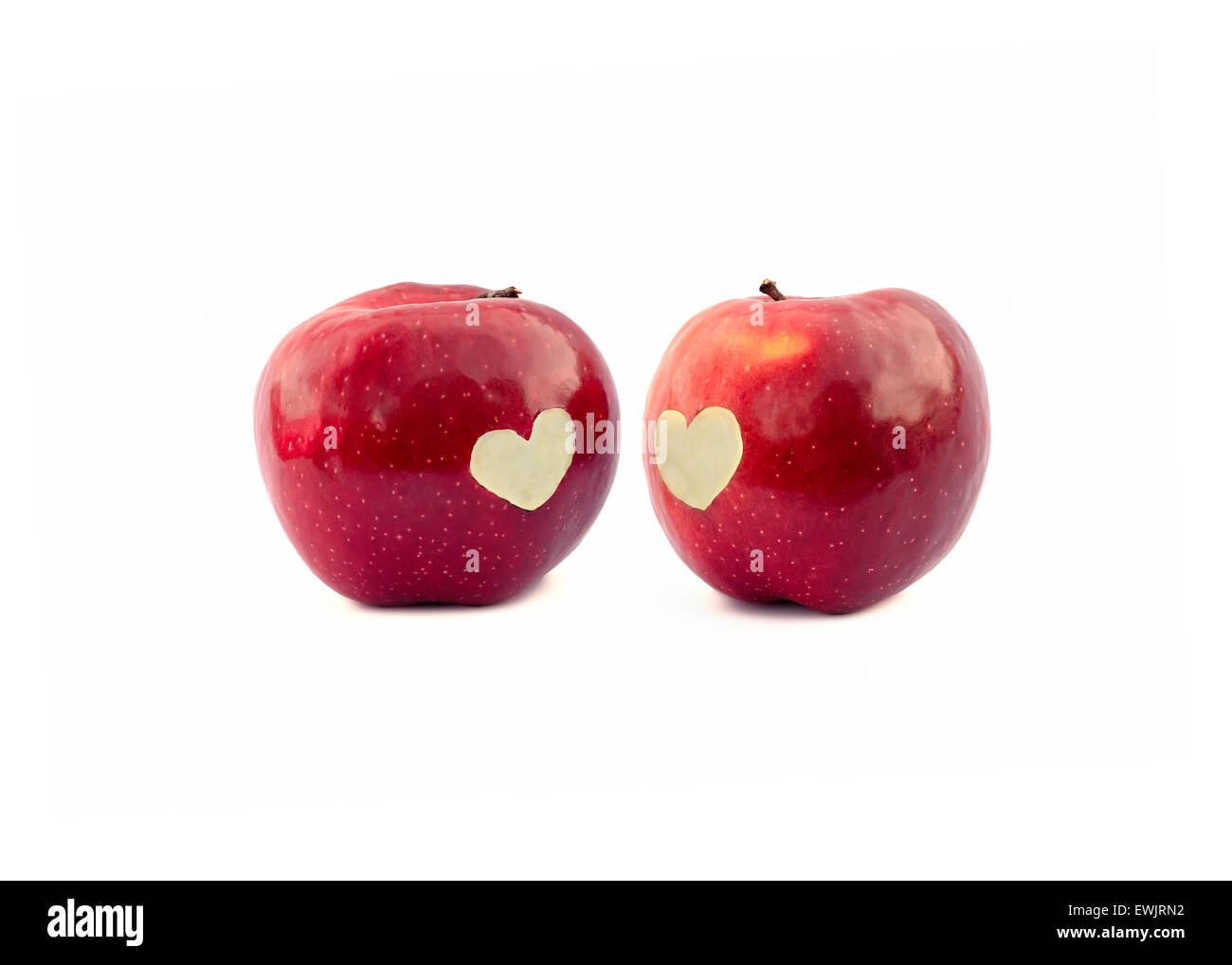 two apples with a symbol heart Stock Photo - Alamy