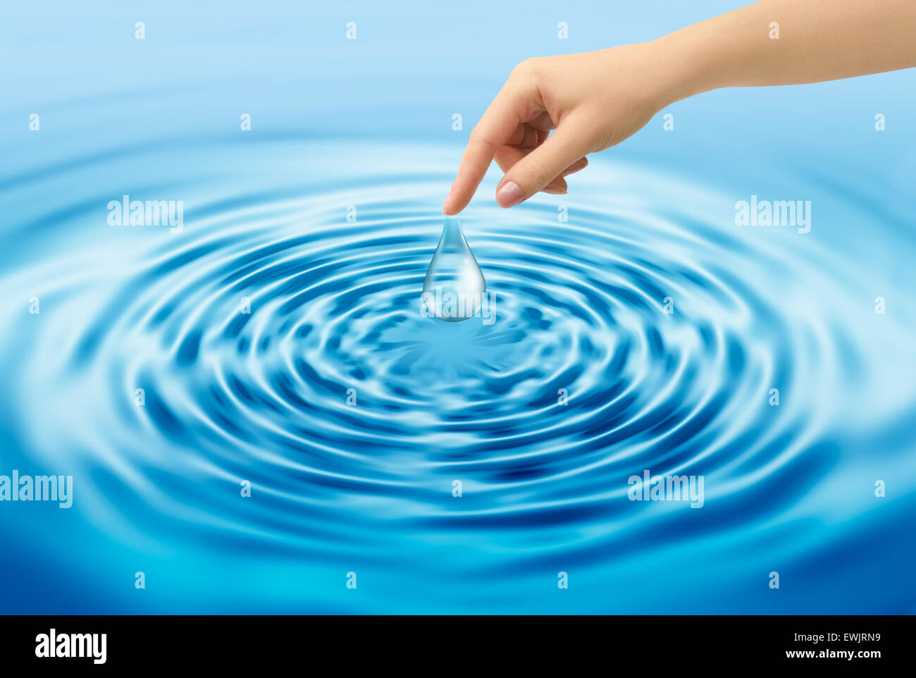 water drop from woman hand Stock Photo - Alamy