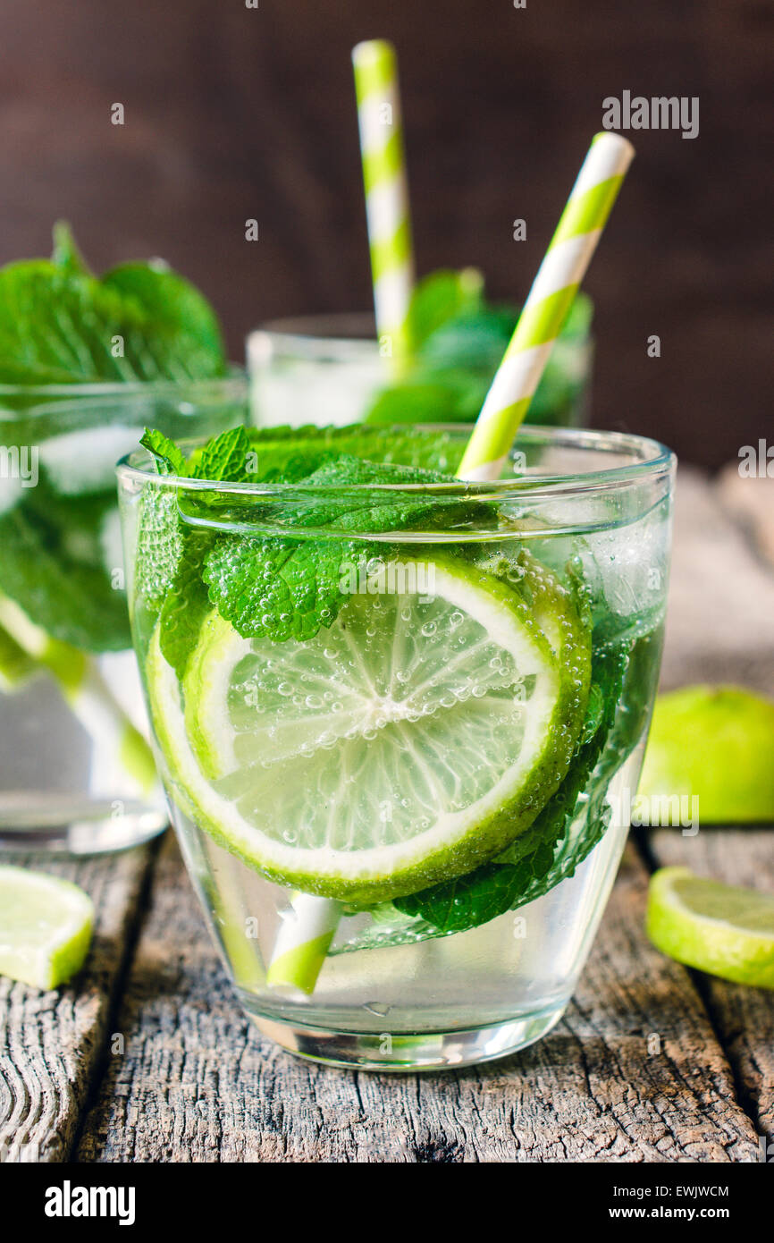 Refreshment drink with lime,mint and ice in glass,selective focus Stock ...