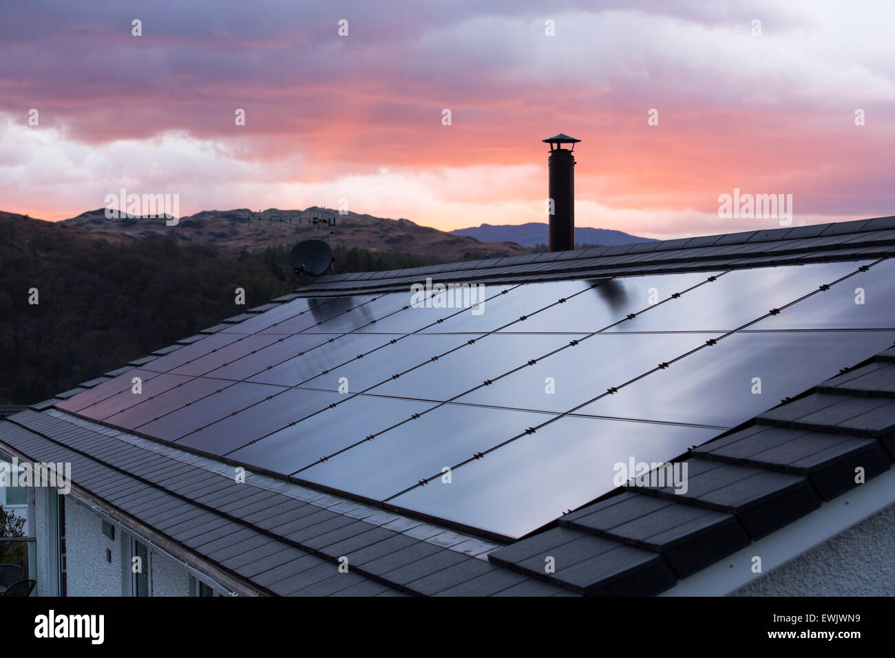 Built in solar panels on a house roof in Ambleside, Lake District, UK ...