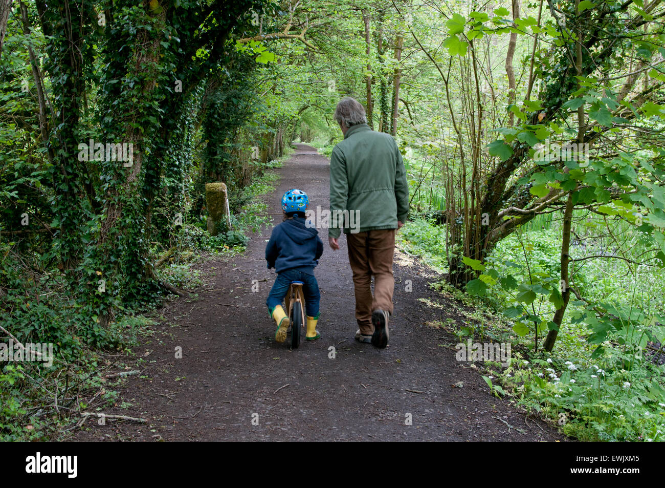 Man walking with helmet hi-res stock photography and images - Alamy