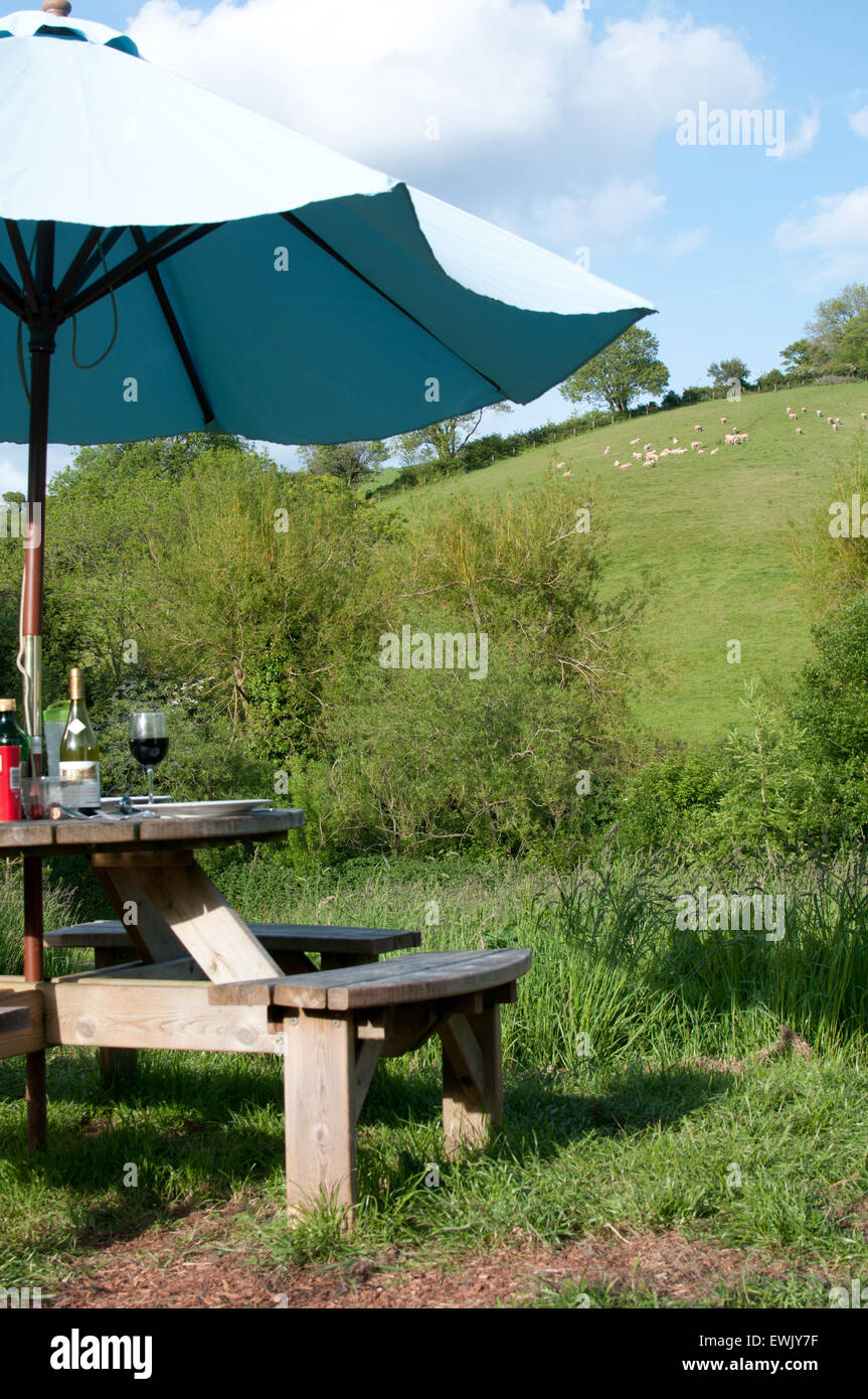 garden table, bench and parasol Stock Photo - Alamy