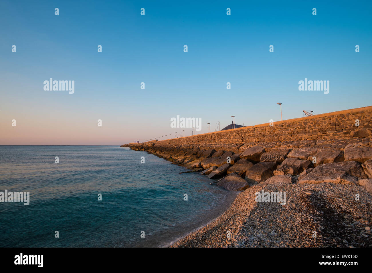 Large breakwater made of huge rocks Stock Photo - Alamy