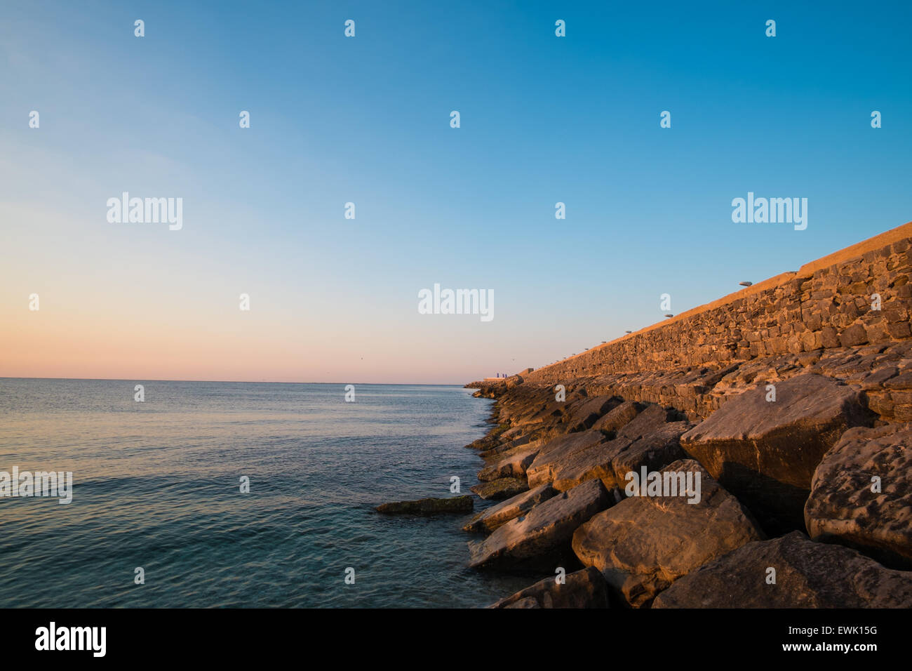 Large breakwater made of huge rocks Stock Photo - Alamy