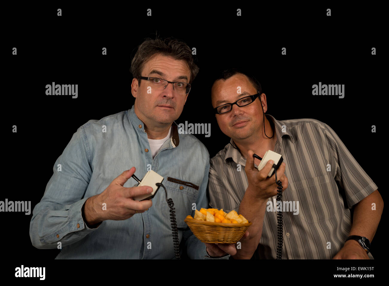 Two guys playing video games hi-res stock photography and images - Alamy