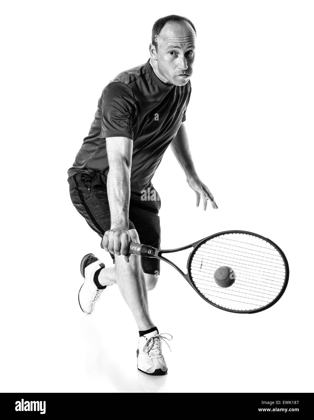 Tennis action shot. Backhand. Studio shot over white Stock Photo - Alamy