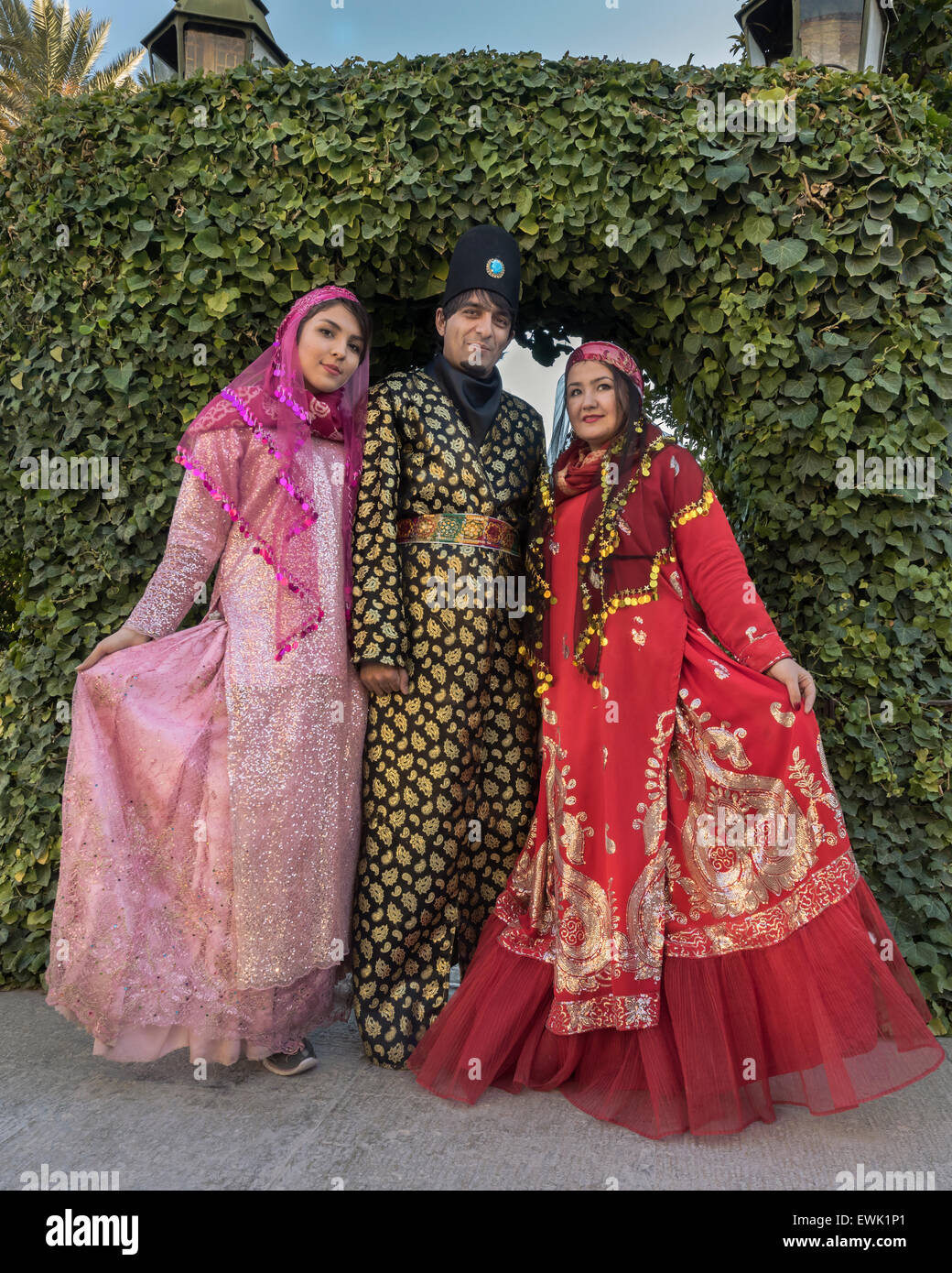 Traditionally attired trio, Zinat Stock Photo - Alamy