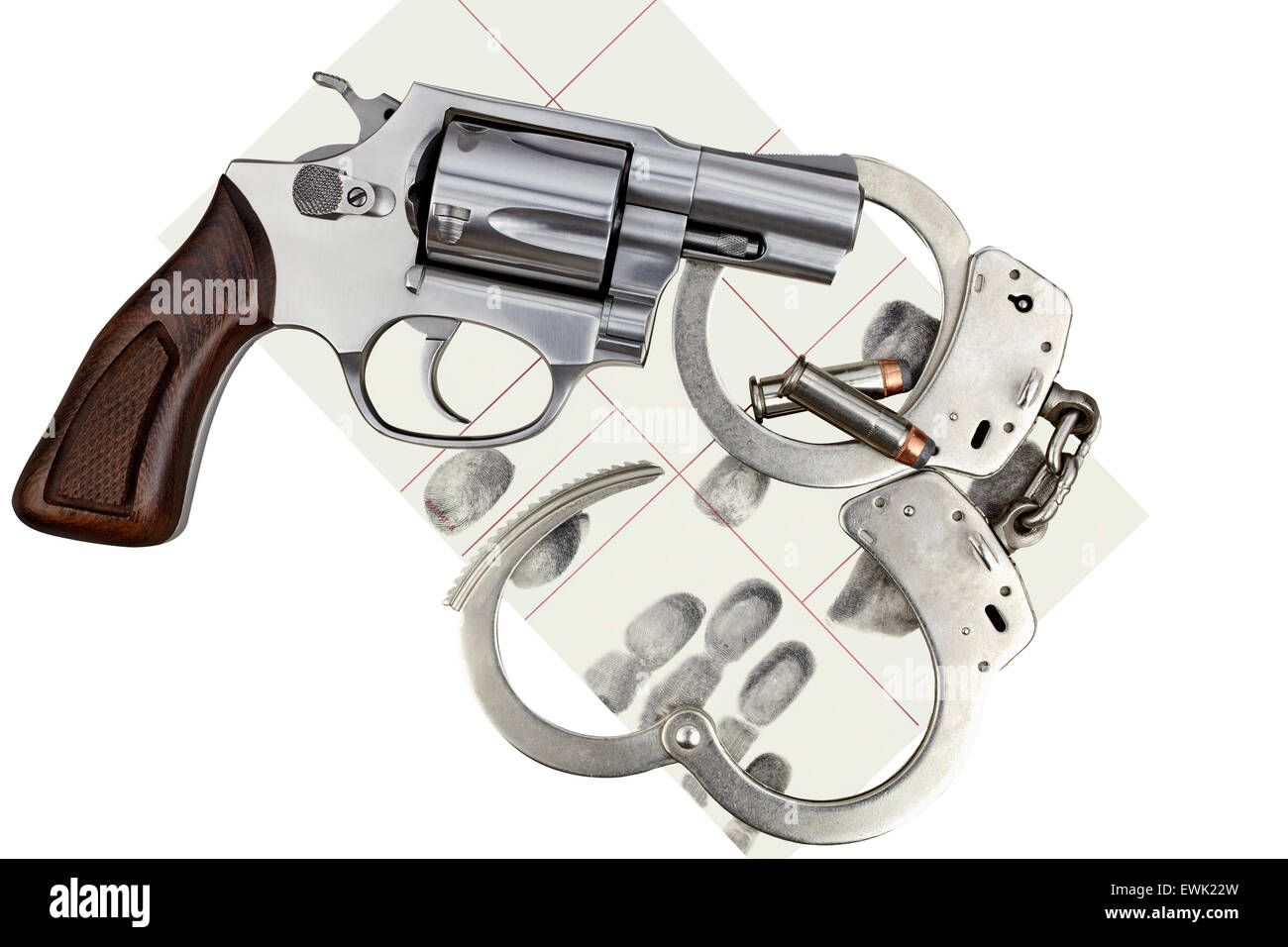 Gun with handcuffs and fingerprint ID for criminal arrest Stock Photo ...