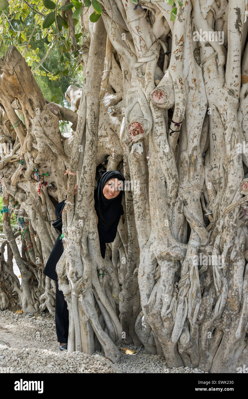 Persian woman at ancient lur tree, Kish Island, Iran Stock Photo - Alamy