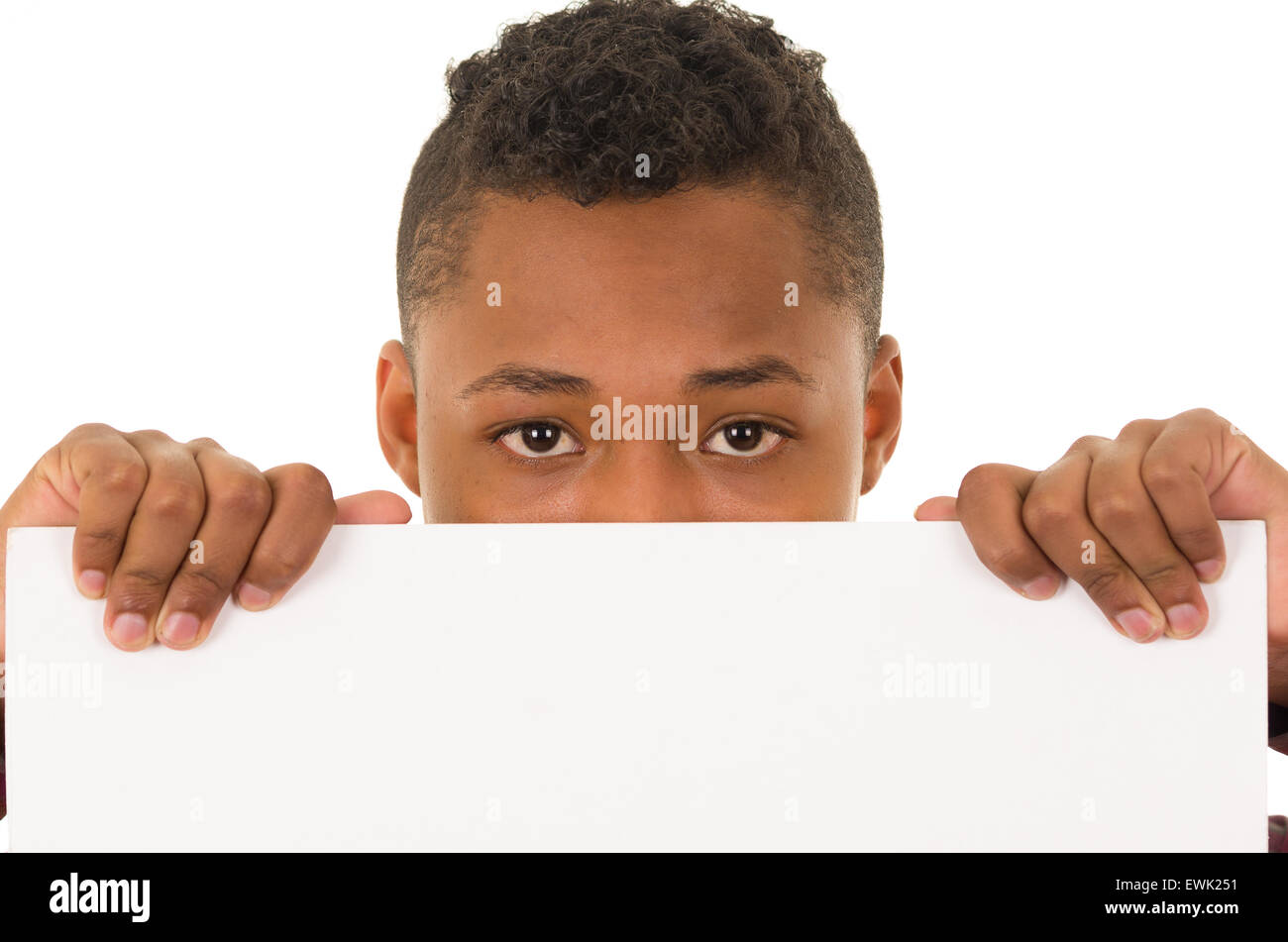 Hispanic male hiding Stock Photo - Alamy