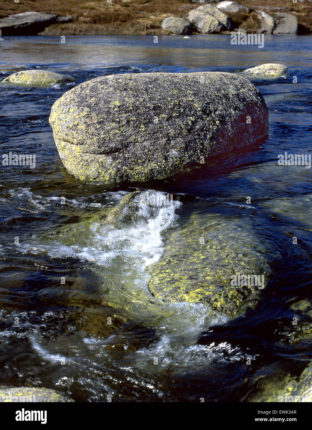 Boulders in stream Stock Photo - Alamy