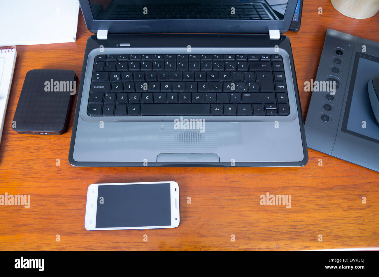 Desk and digital devices Stock Photo - Alamy
