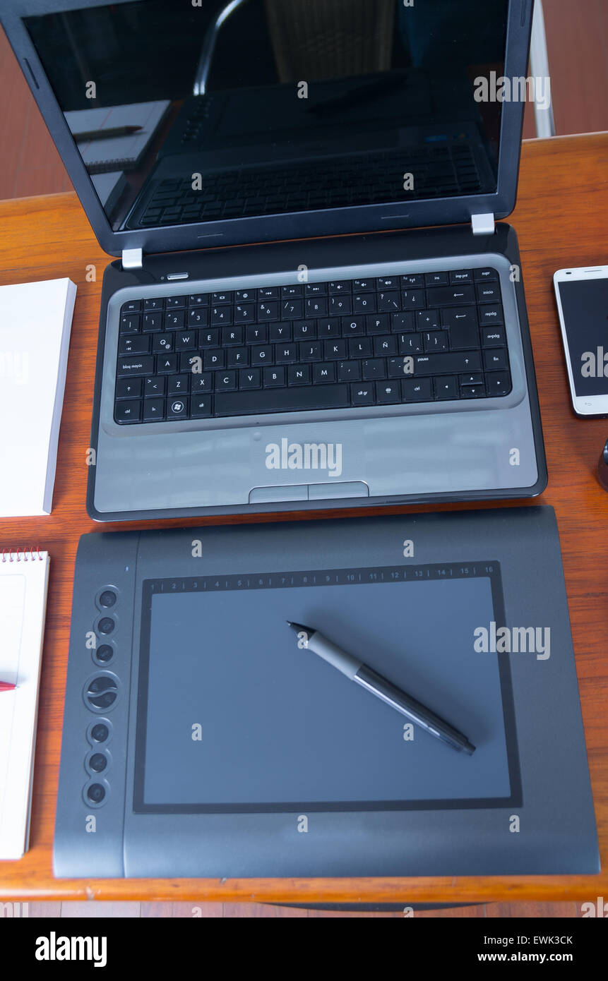 Desk and digital devices Stock Photo - Alamy