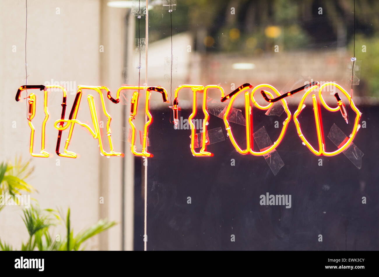 Tattoo letters on fire Stock Photo - Alamy