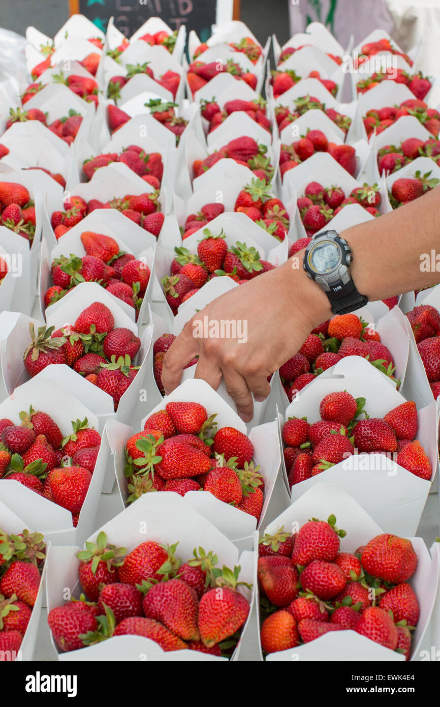 Hand reaching for fruit hi-res stock photography and images - Alamy