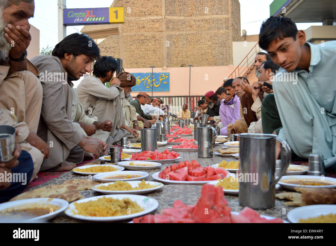 Quetta. 27th June, 2015. Pakistani Muslim devotees break their fast during the holy month of ...
