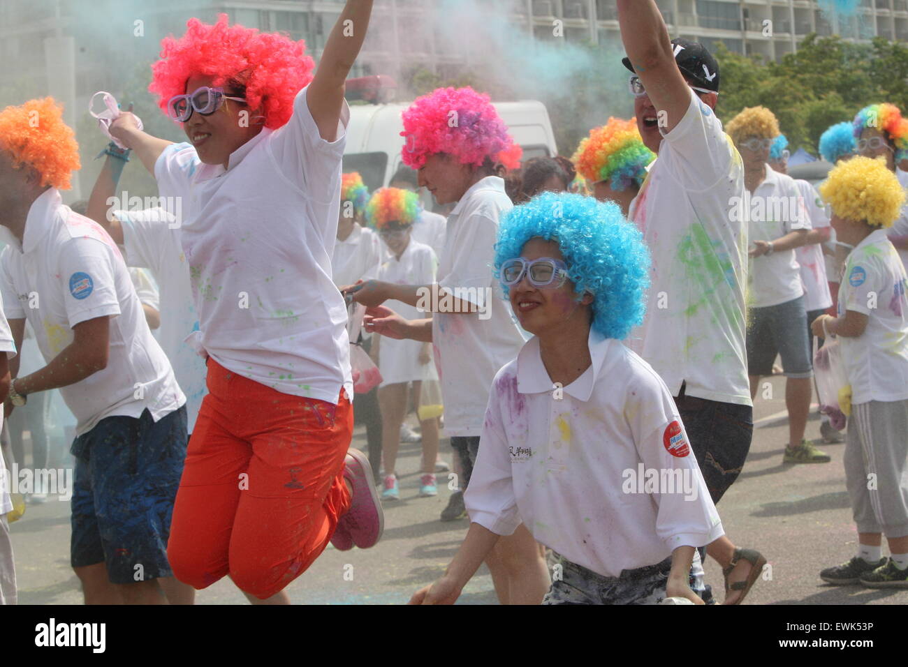 Yantai, China's Shandong Province. 28th June, 2015. People take part in ...