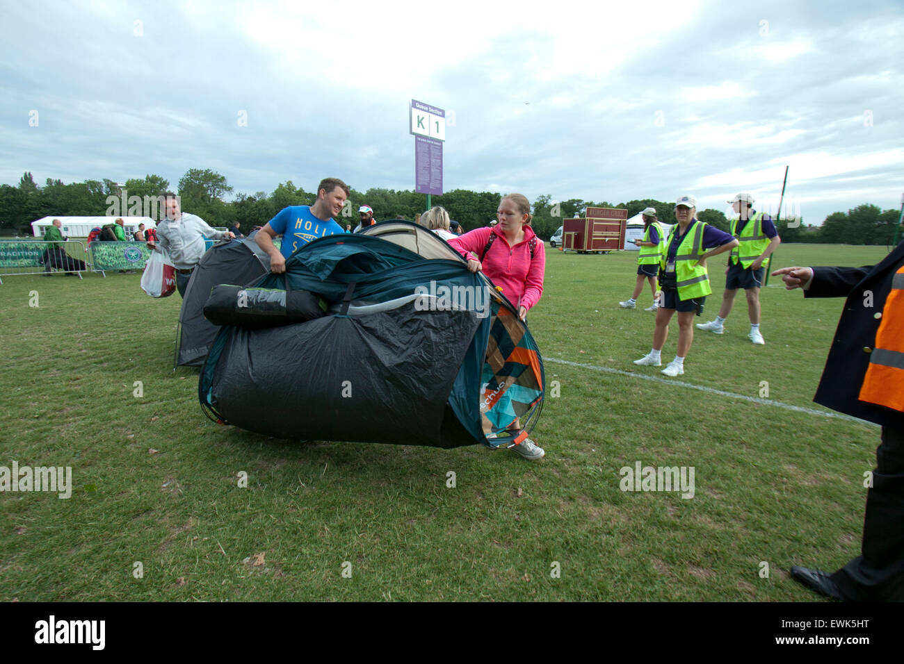 Wimbledon, London, UK. 28th June, 2015. The first queuers bring their ...
